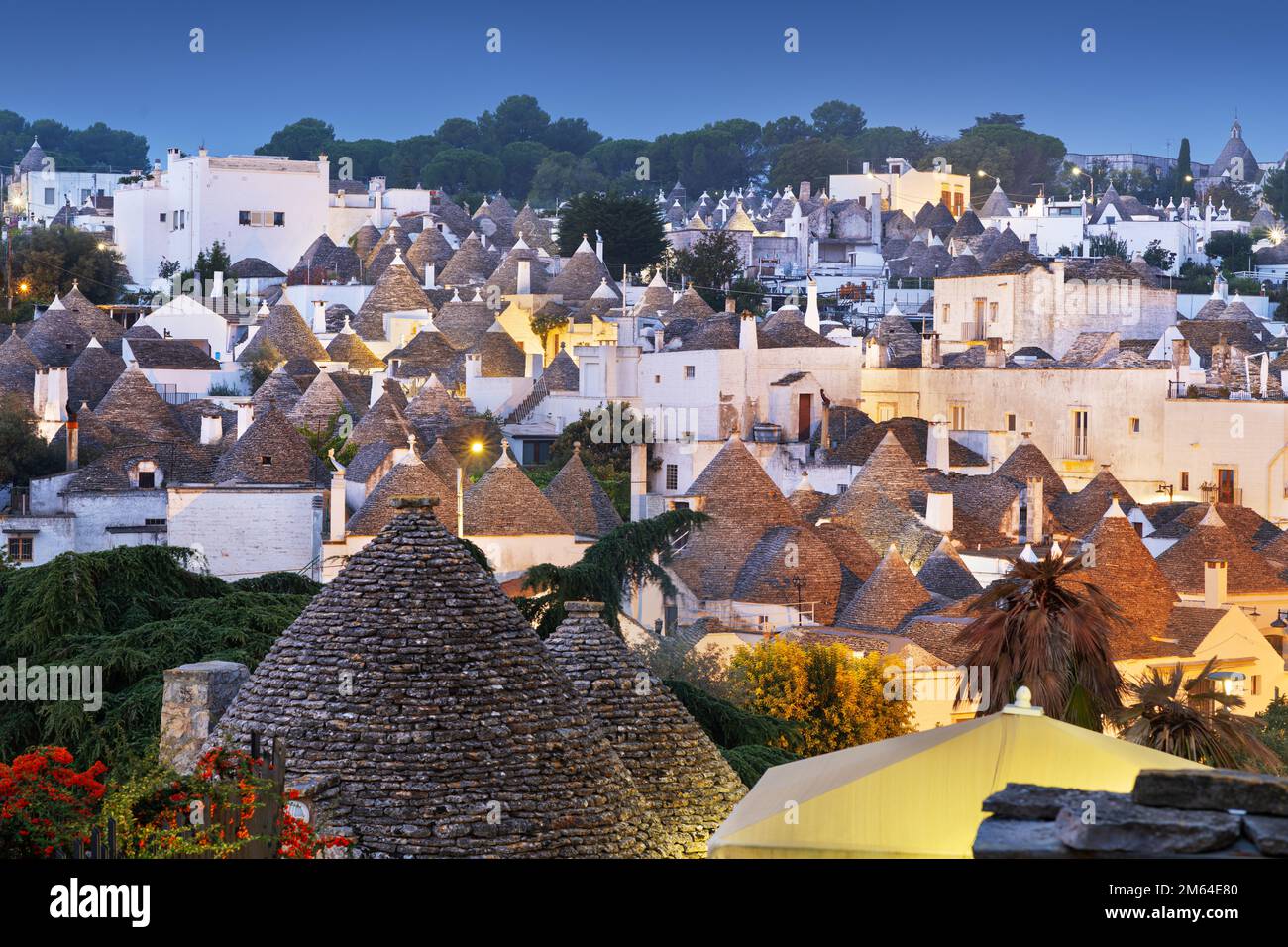 Alberobello, Italy with trulli houses at night Stock Photo - Alamy
