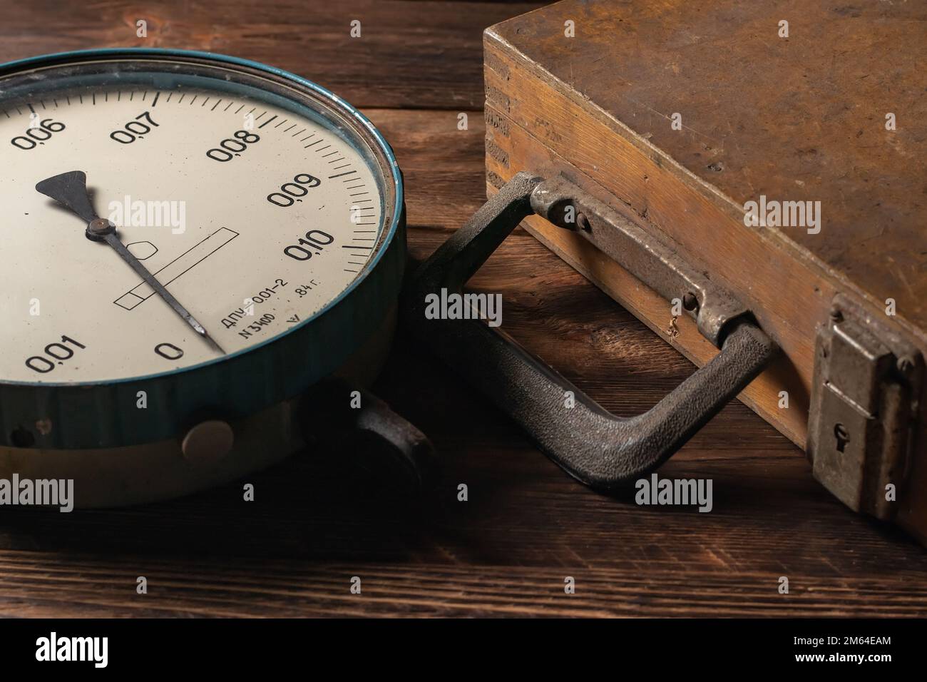 Old vintage scales with arrows, in box on a wooden background Stock ...