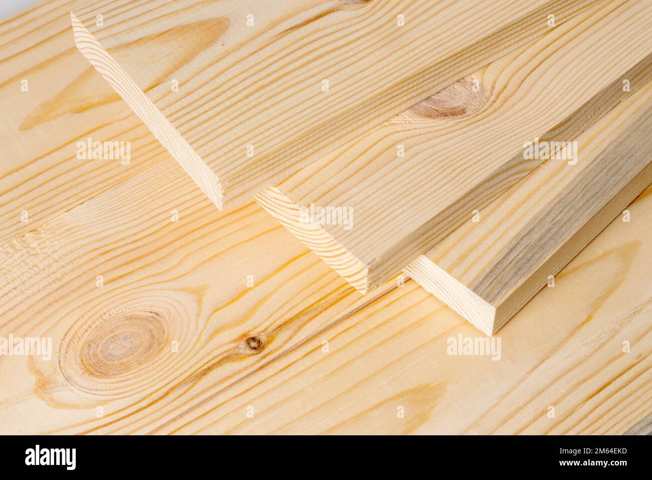 Stacks of pine wood planks. Natural rough wooden boards boards, lumber ...