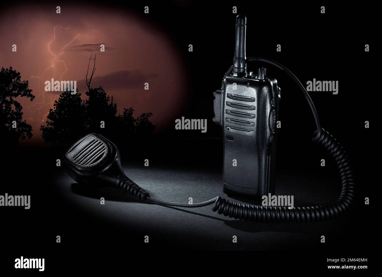 Lightning storm behind a two way radio and mike Stock Photo - Alamy