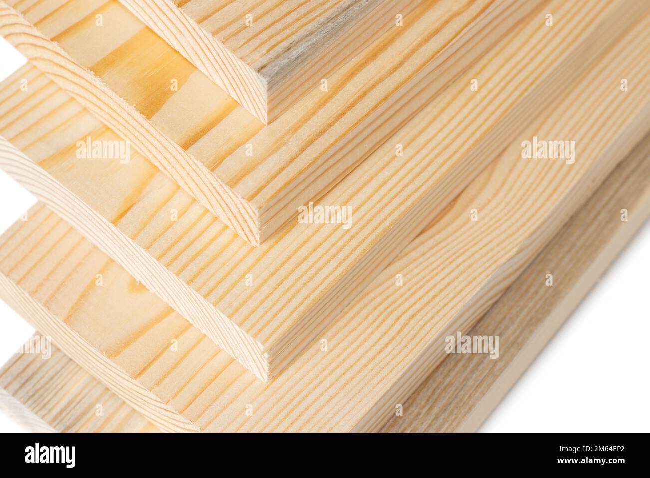 Wooden boards on white in a woodworking industry. stacks with pine ...