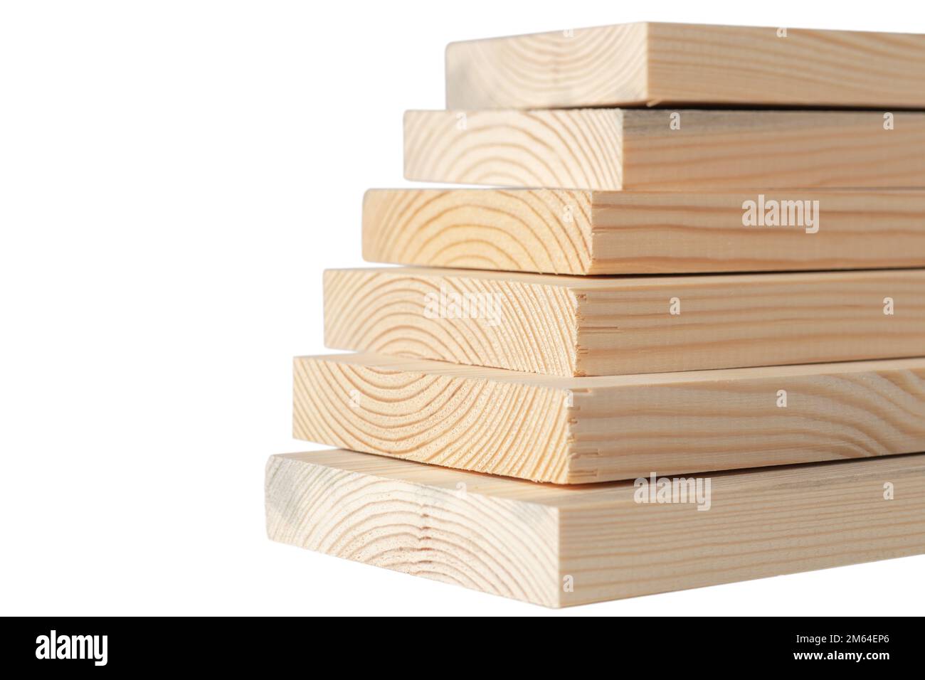 Wooden boards on white in a woodworking industry. stacks with pine ...