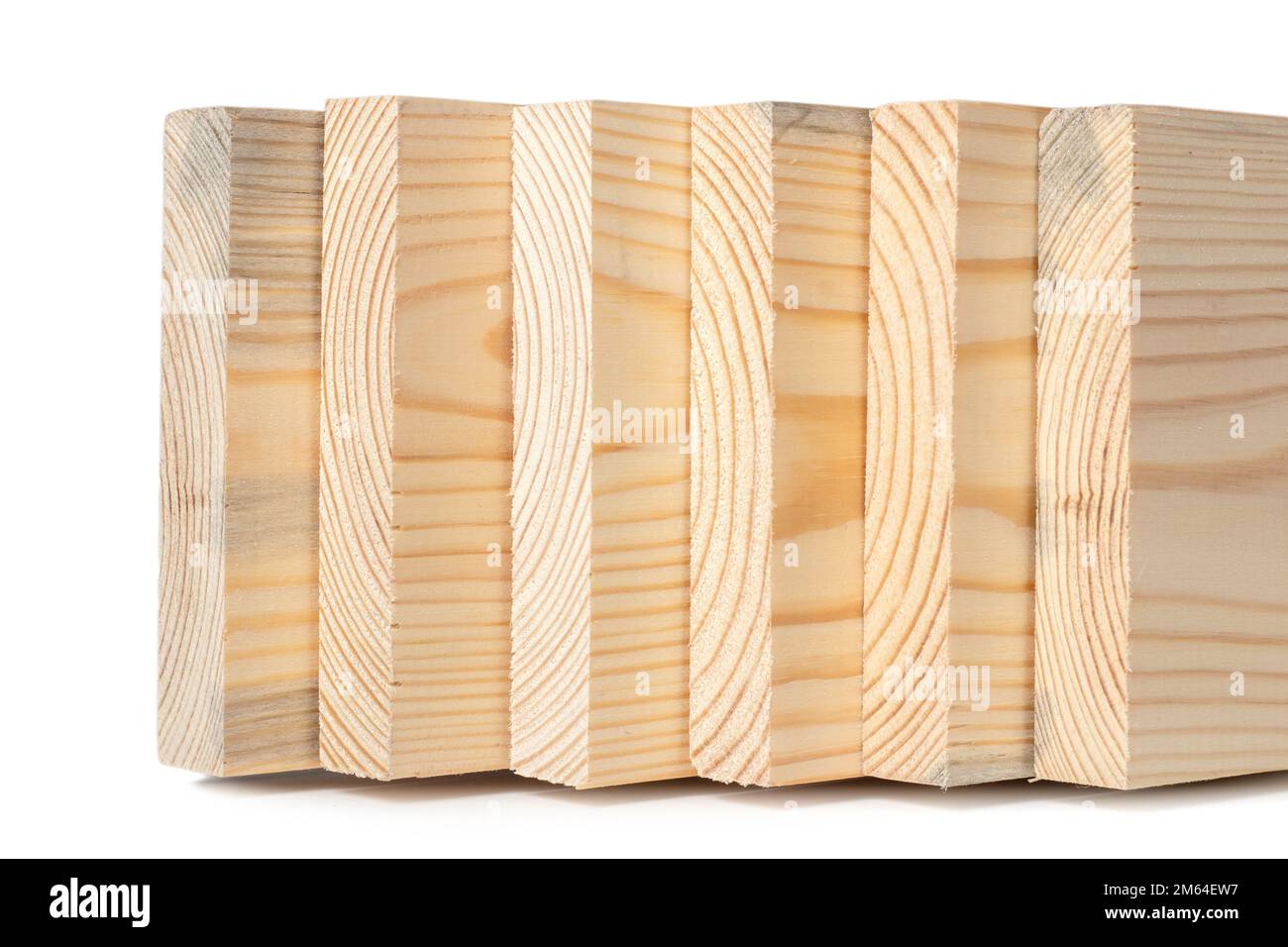 Wooden boards on white in a woodworking industry. stacks with pine ...