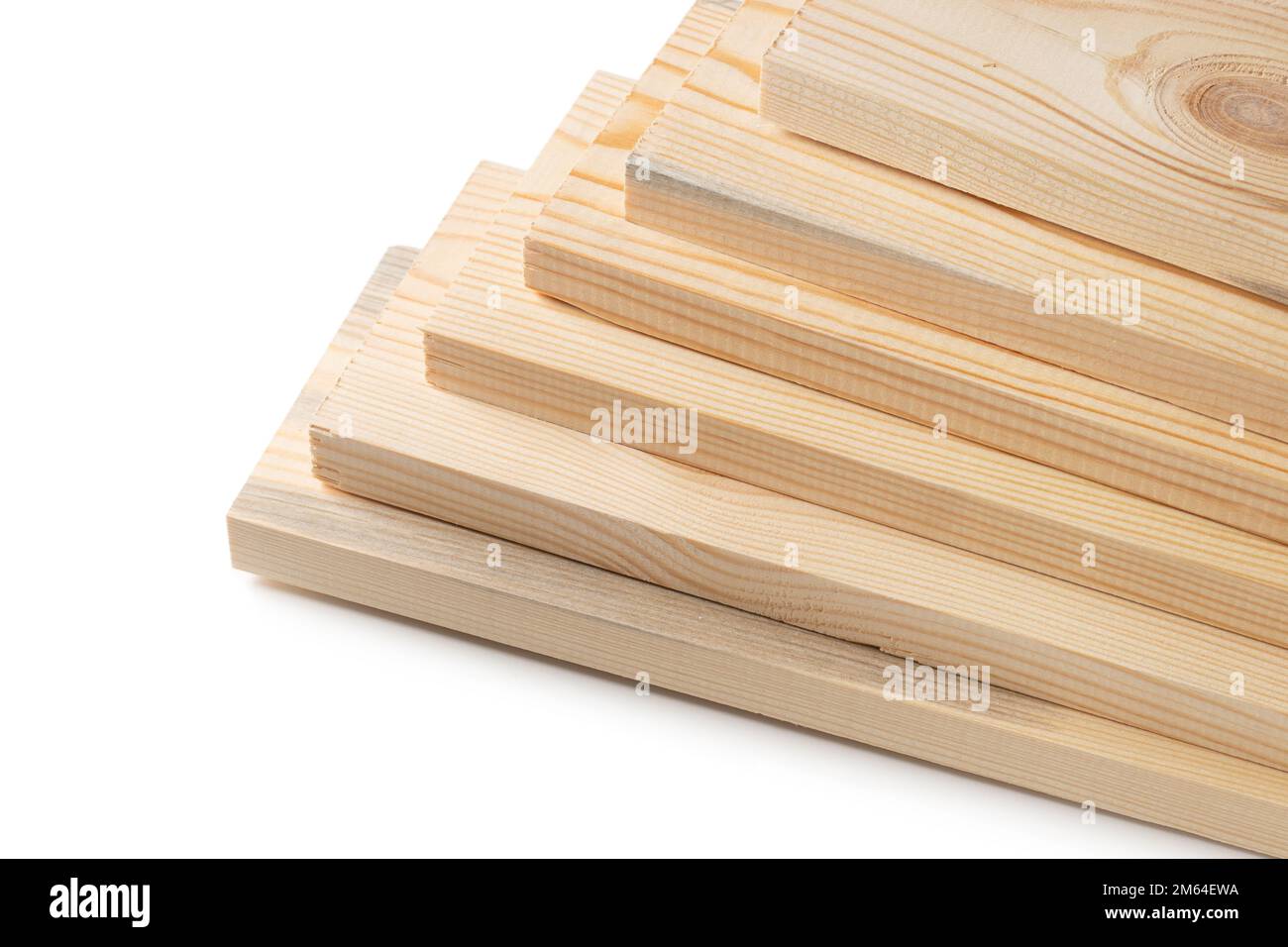Wooden boards on white in a woodworking industry. stacks with pine ...