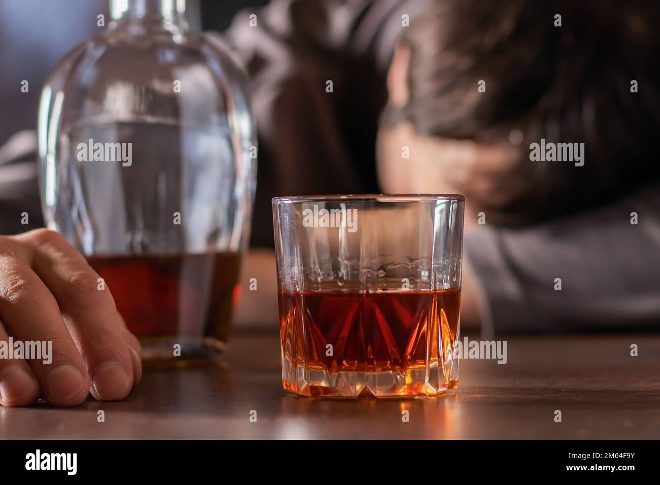 Alcoholism, alcohol addiction and people concept - male alcoholic with ...