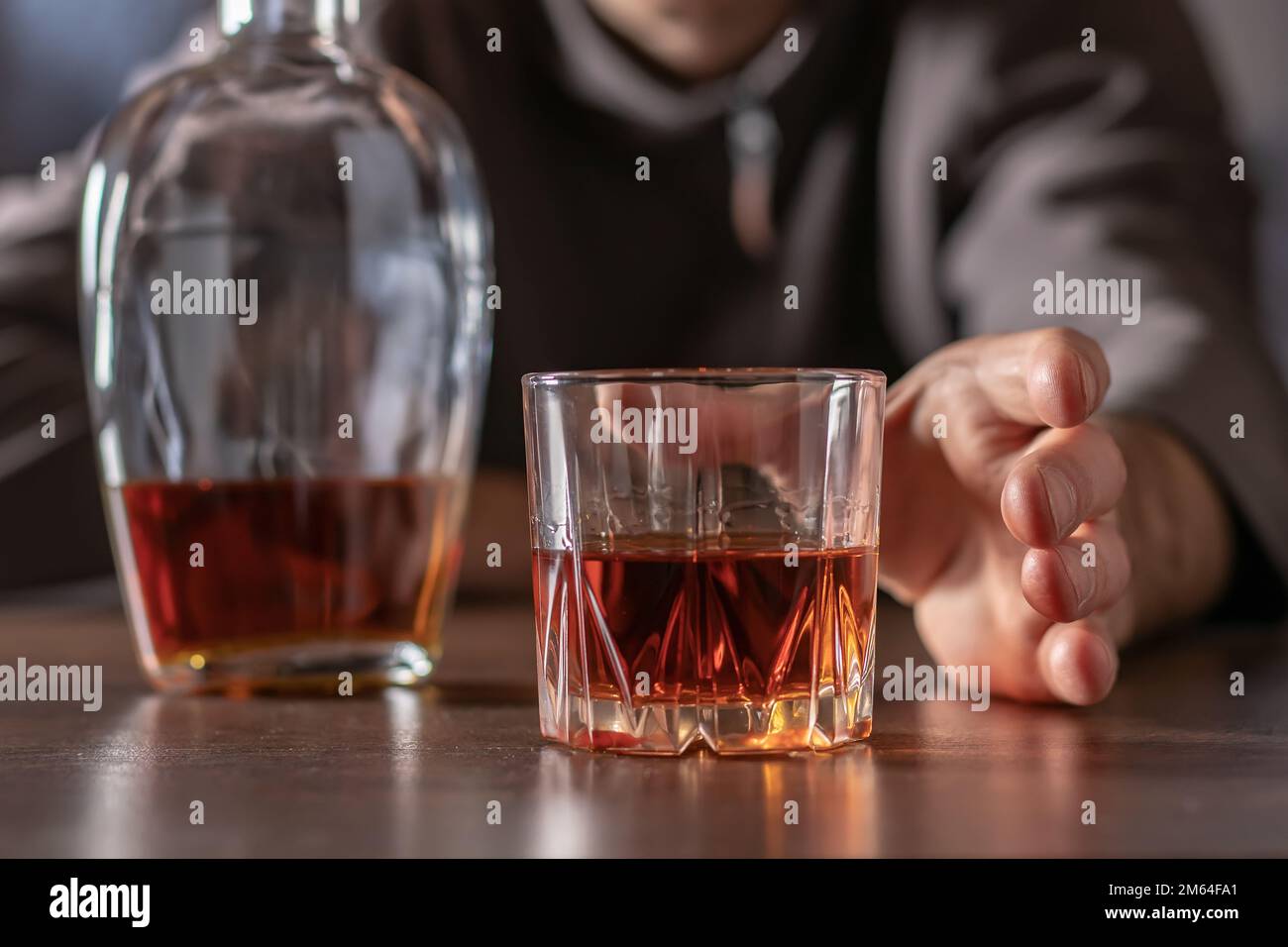 Alcoholism, alcohol addiction and people concept - male alcoholic pulls ...