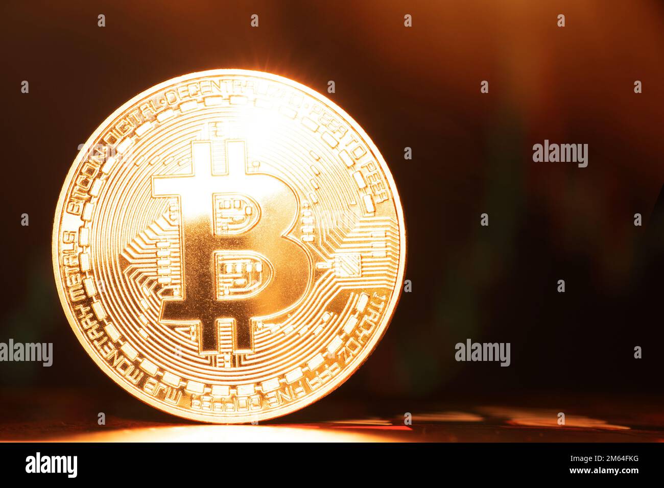 Bitcoin gold coin and defocused chart background. Virtual ...