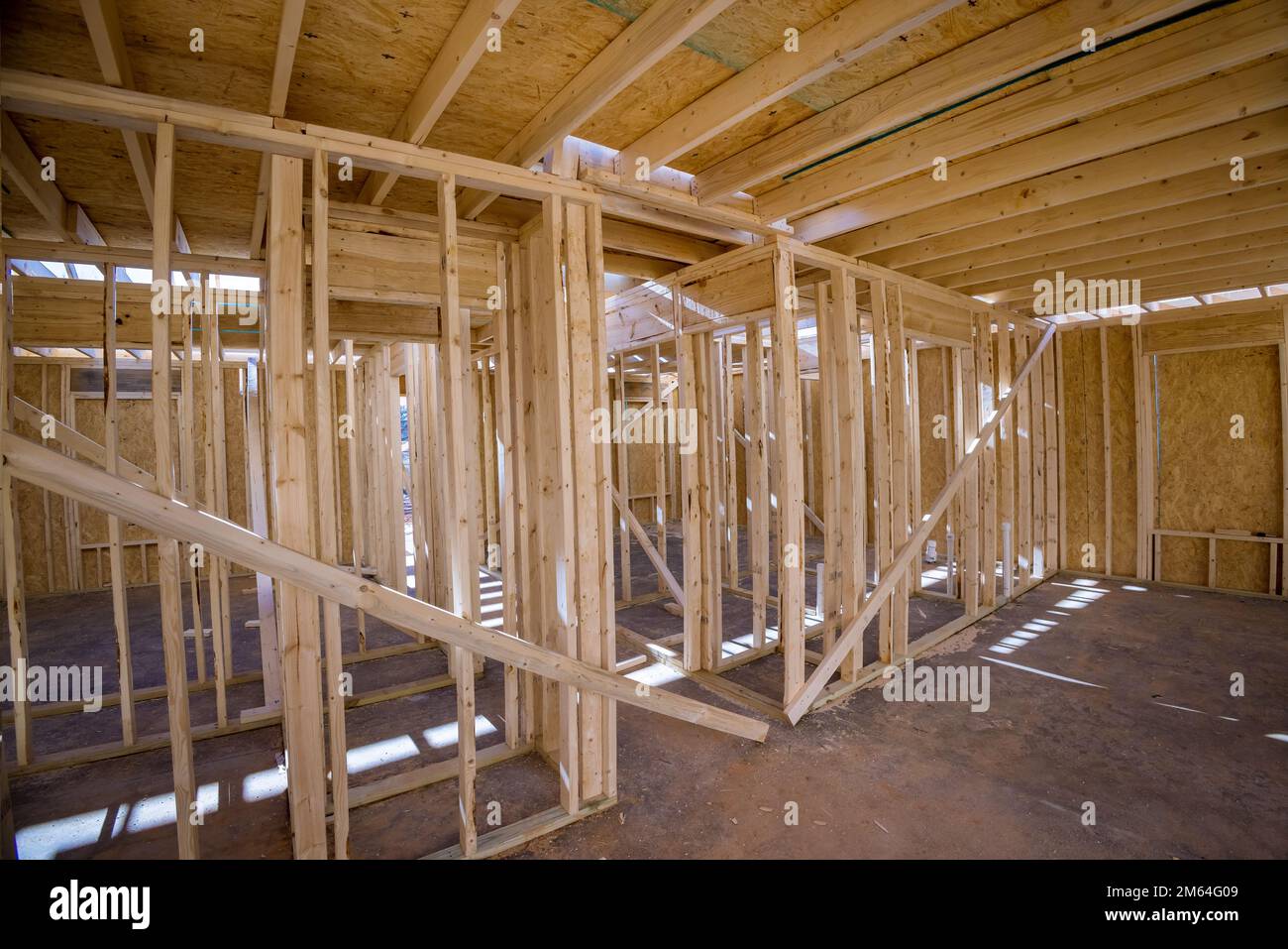 Wood framing beams stick framework of built interior new house under ...