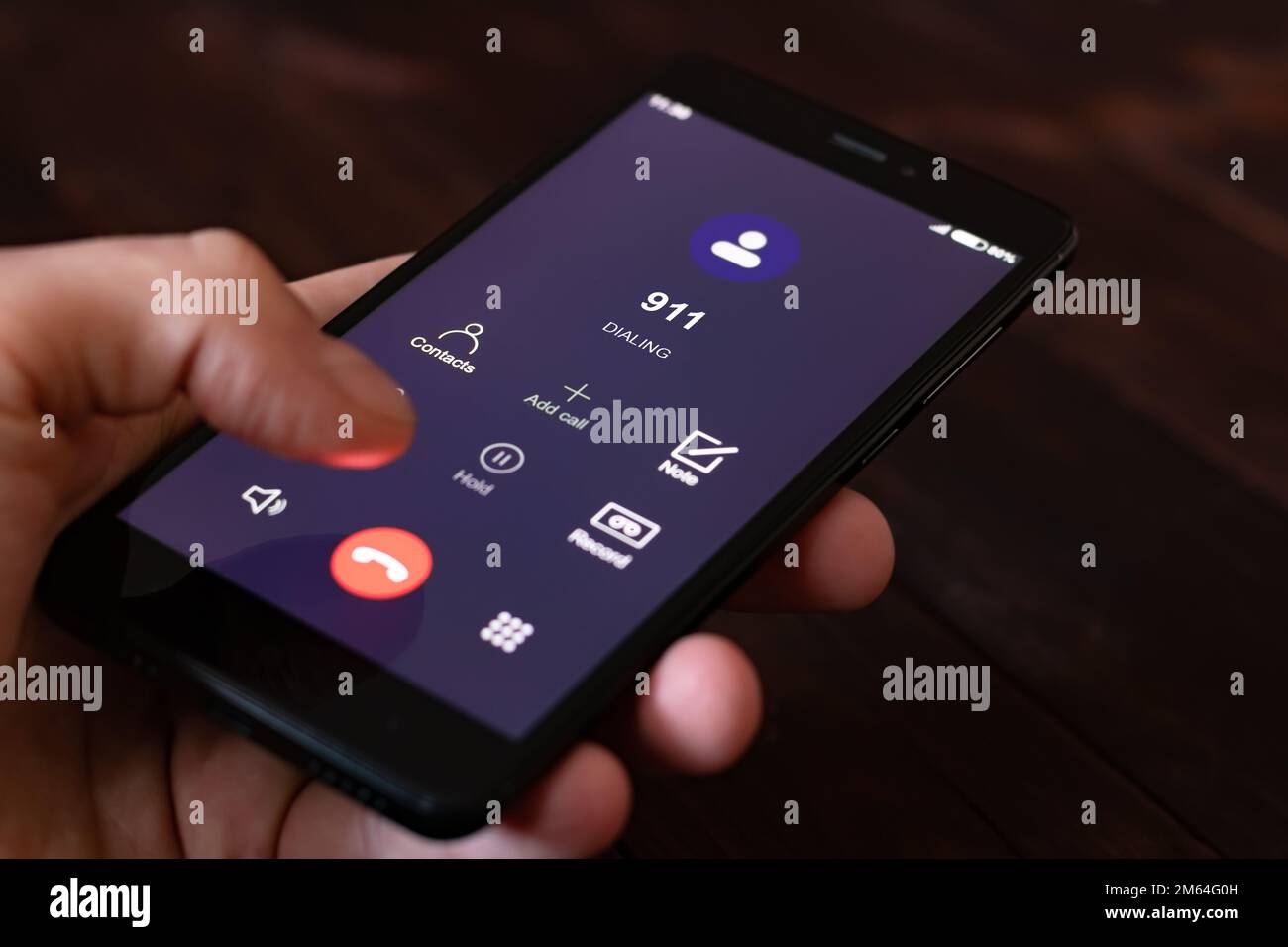 Dialing 911, call 911. Emergency concept: man using a digital phone ...