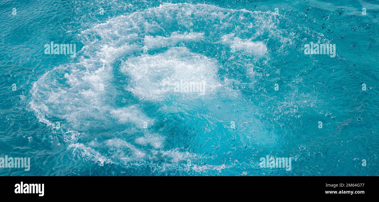Splashes of blue, sea water with foam bubbles. A splash of nature on a ...