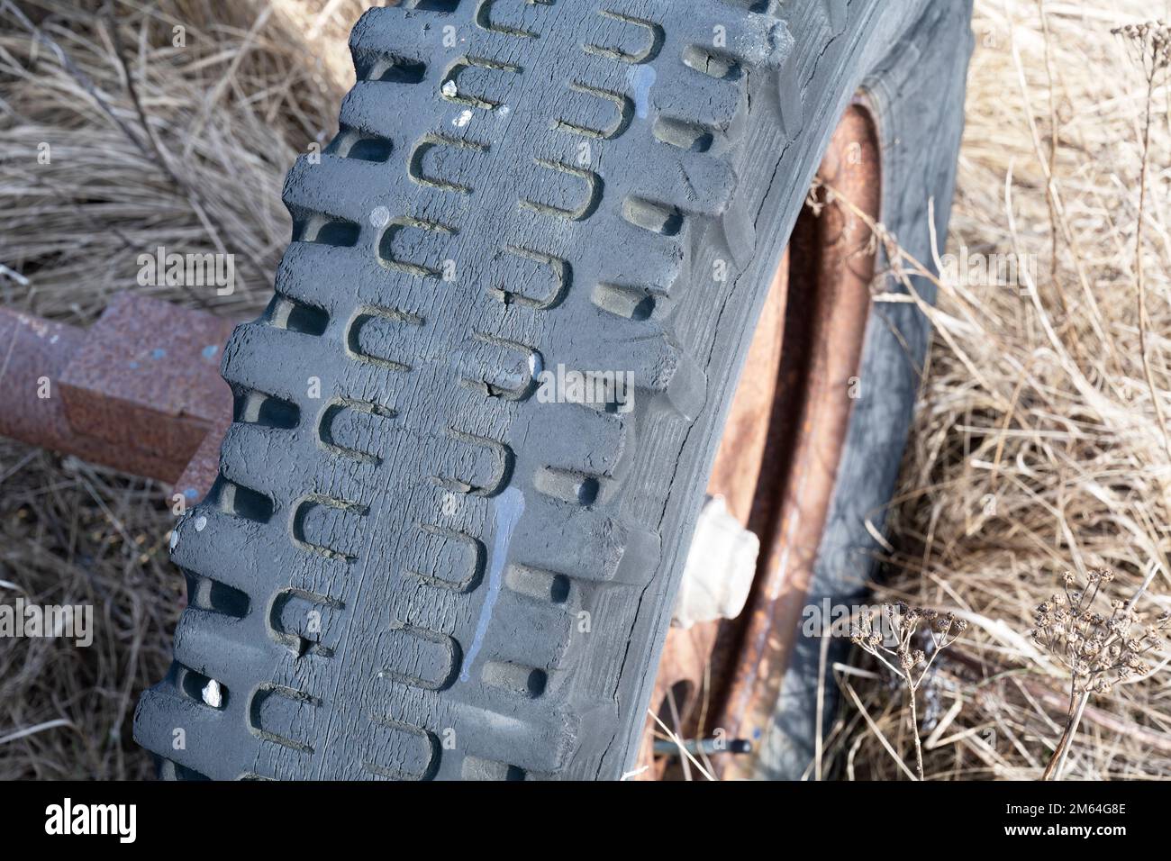 Old rubber tyre on a Rusty wheel Stock Photo - Alamy
