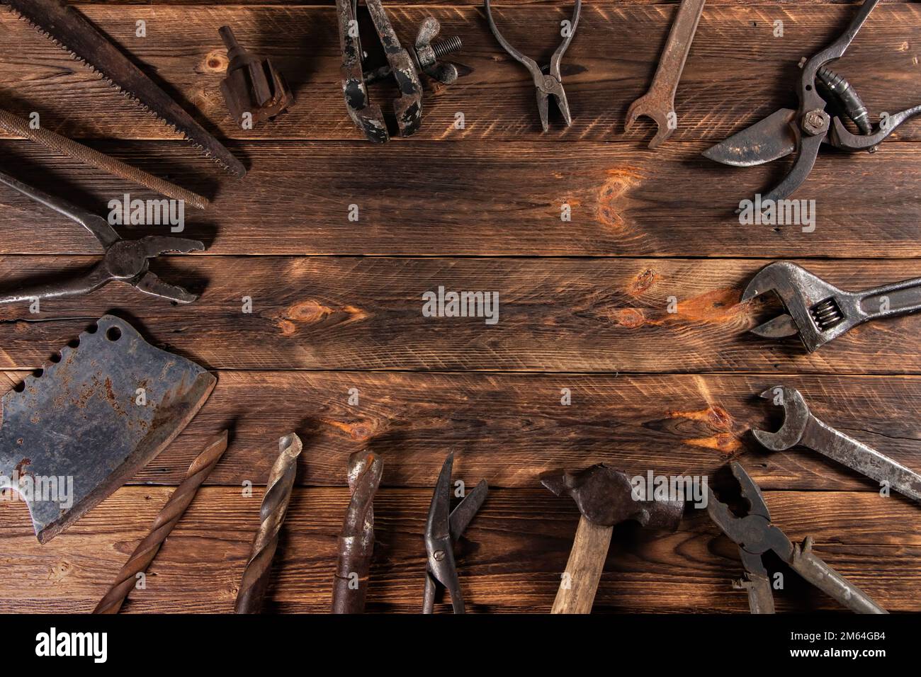 Old working tools. Vintage working tools on wooden background Stock ...