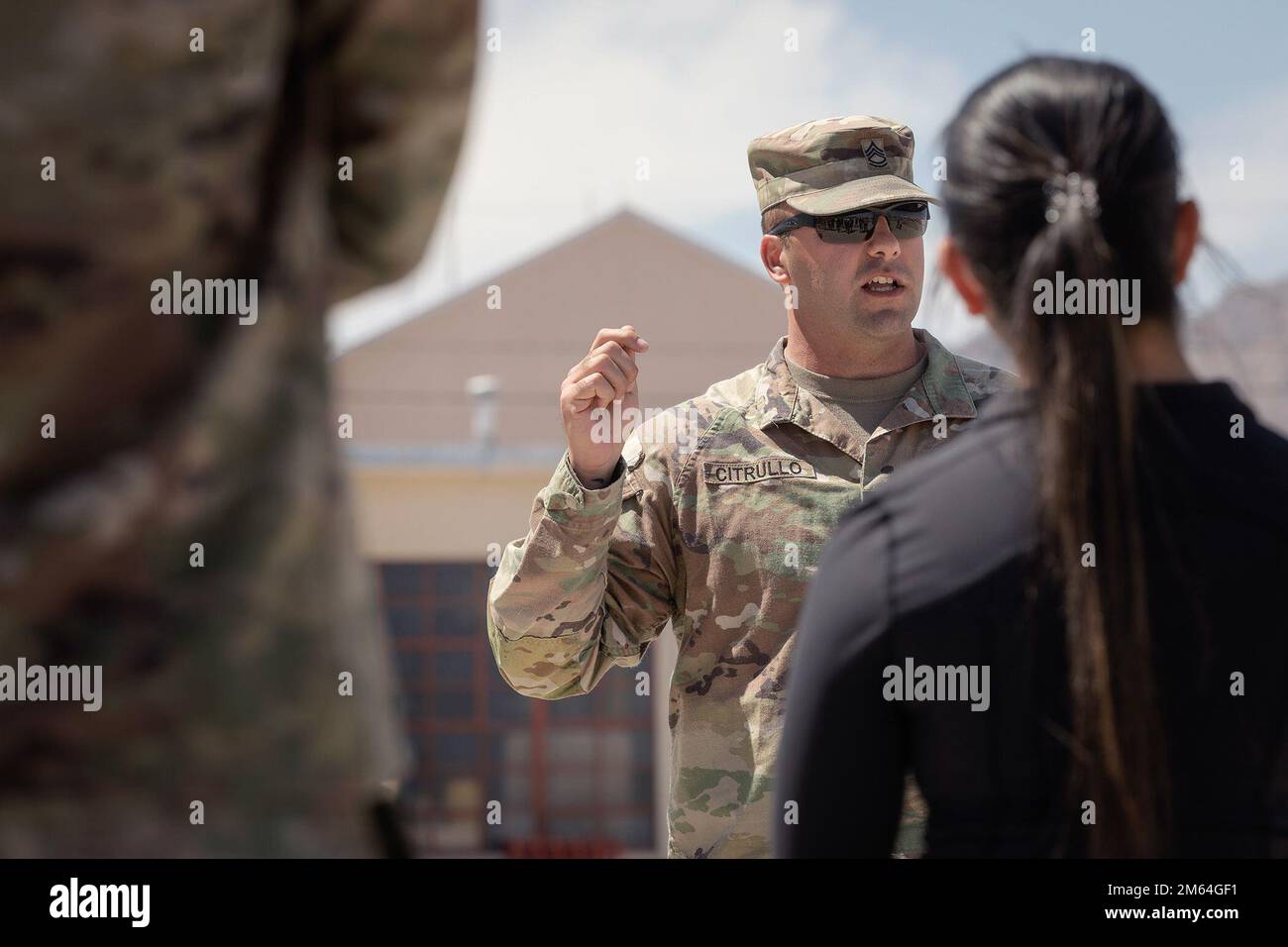 A 93rd Military Police Battalion noncommissioned officer chats with ...