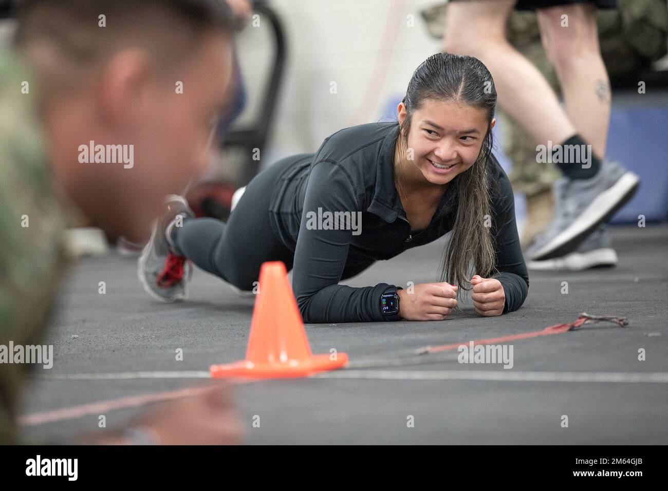 Christine Fernando, a 93rd Military Police Battalion spouse, planks ...