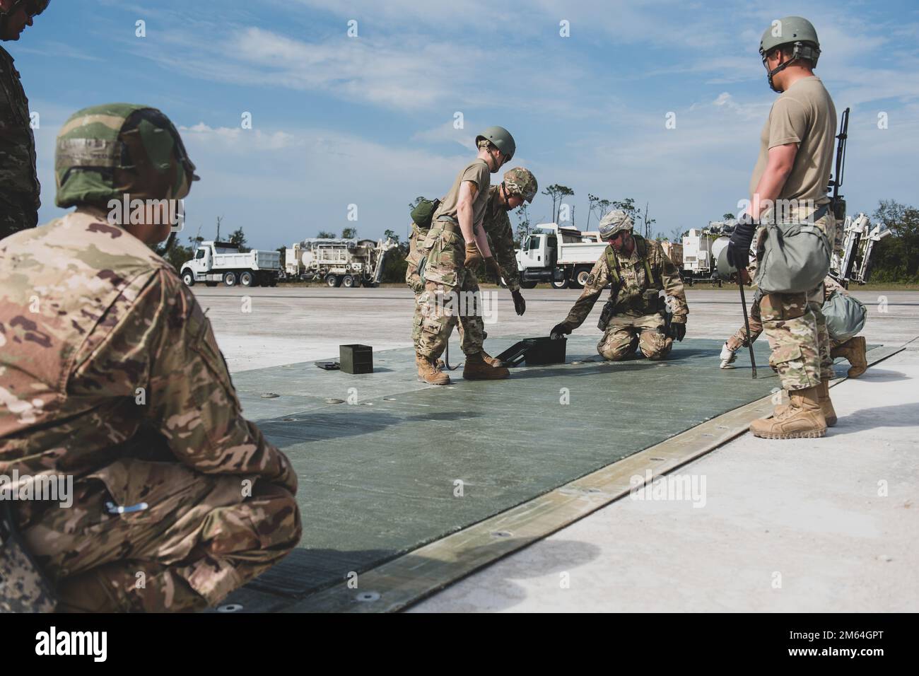 U.S. Air Force Airmen assemble the FRP (Fiber-Reinforced Polymer) to ...