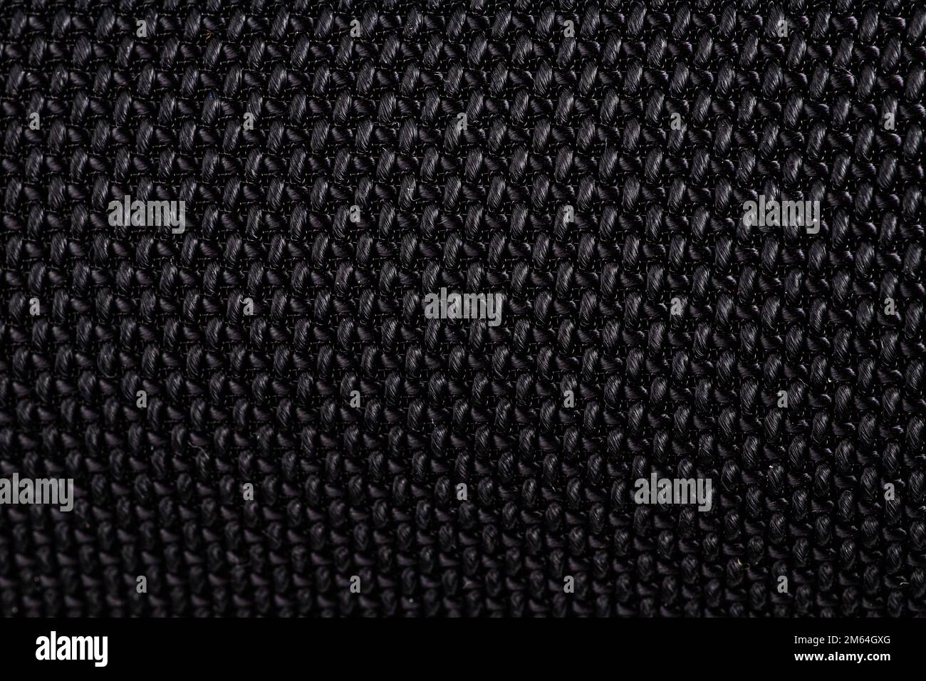 Black woven background of intertwined threads Stock Photo - Alamy