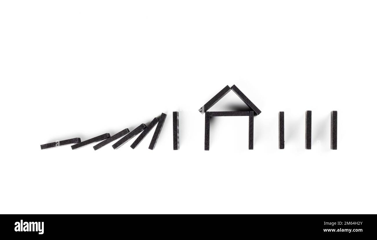 Black Domino on white background. Falling dominoes on the house. Domino ...