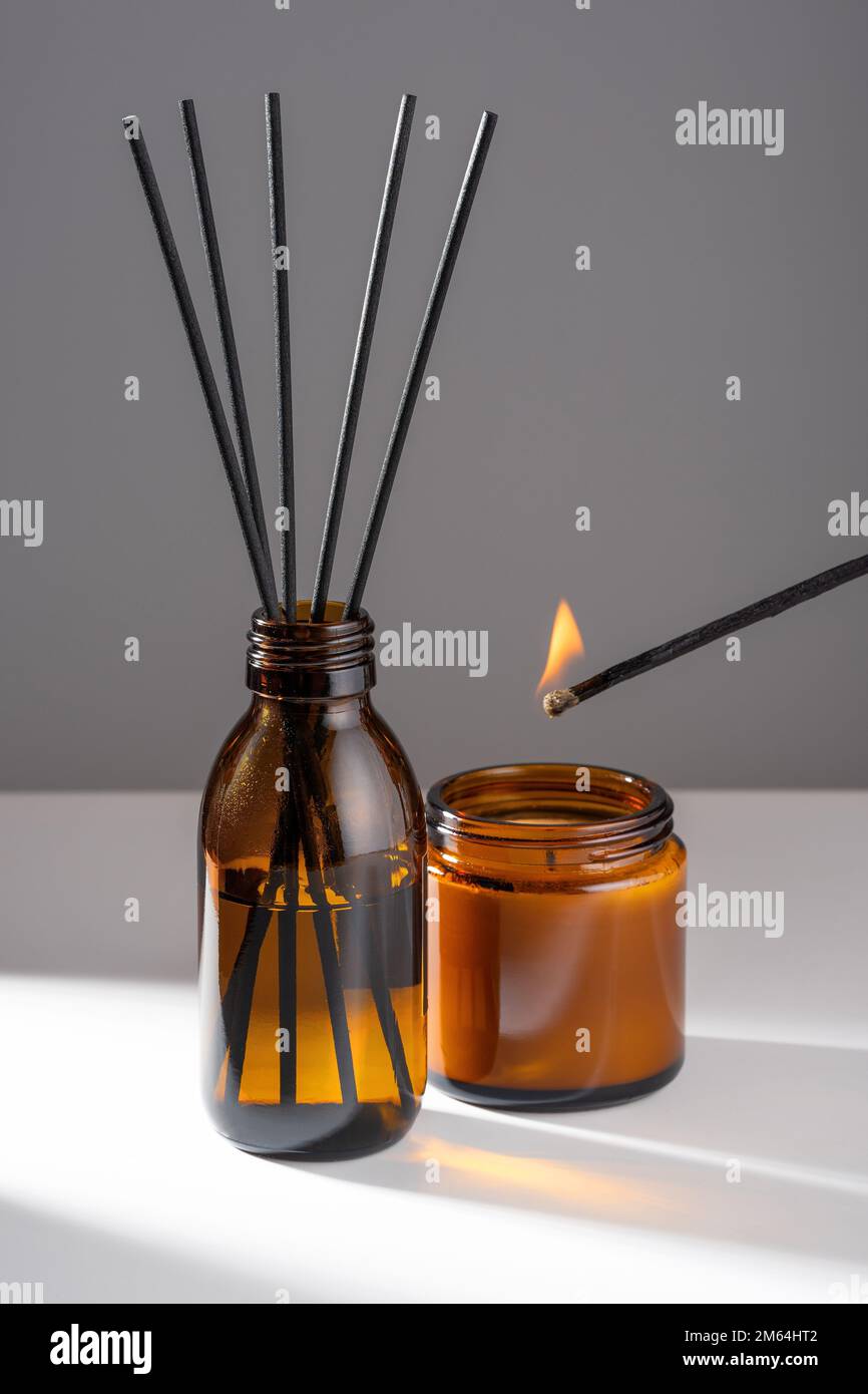 Aroma diffuser with natural essential oil in brown glass bottle, soy ...