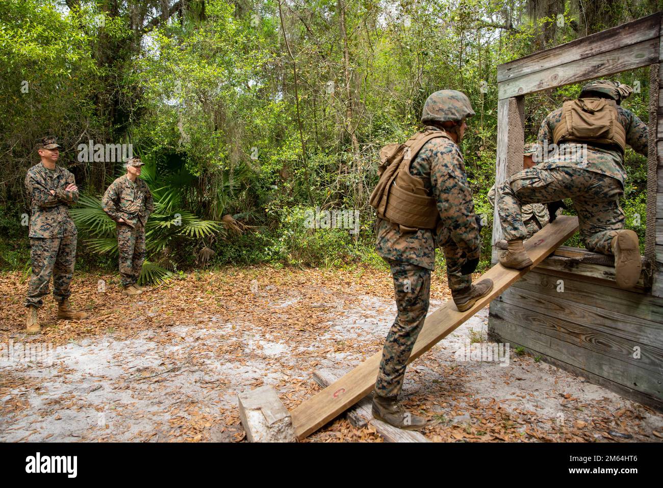 U.S. Marine Corps Col. Douglas R. Burke, center, commanding officer ...