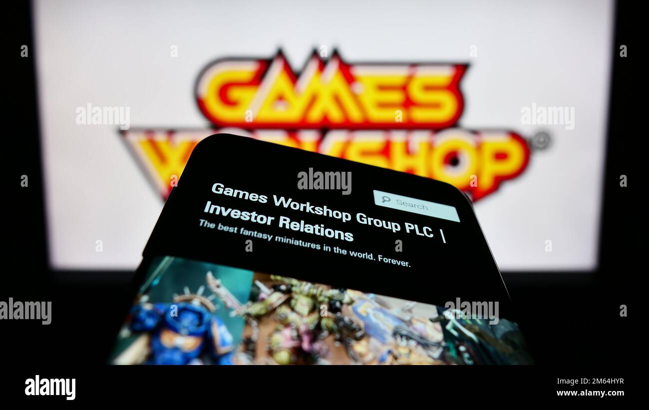 Mobile phone with website of British company Games Workshop Group plc ...