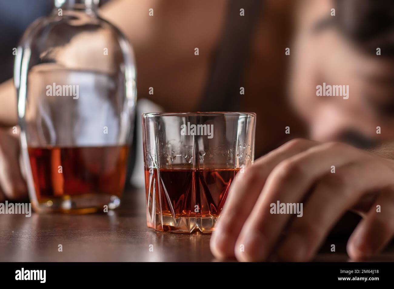 Alcoholism, alcohol addiction and people concept - male alcoholic with ...