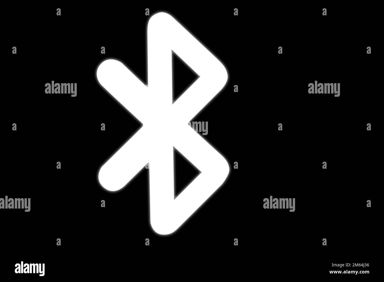 Glowing bluetooth button on black background Stock Photo - Alamy
