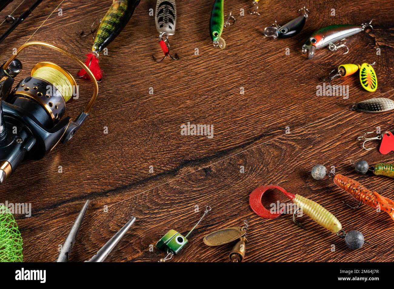 Fishing theme. Frame with reel, rod, fishing buoy, compass, feeder ...