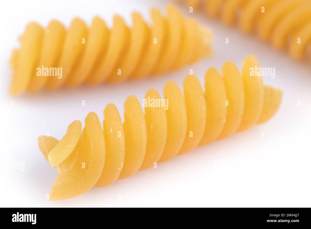 Variety of types and shapes of dry Italian pasta on white background ...