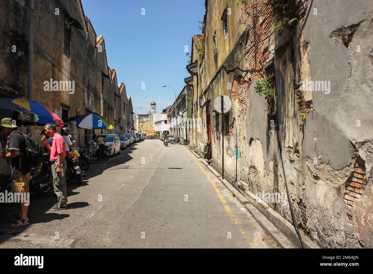 Georgetown, Penang, Malaysia - November 2012: A narrow alley passing ...