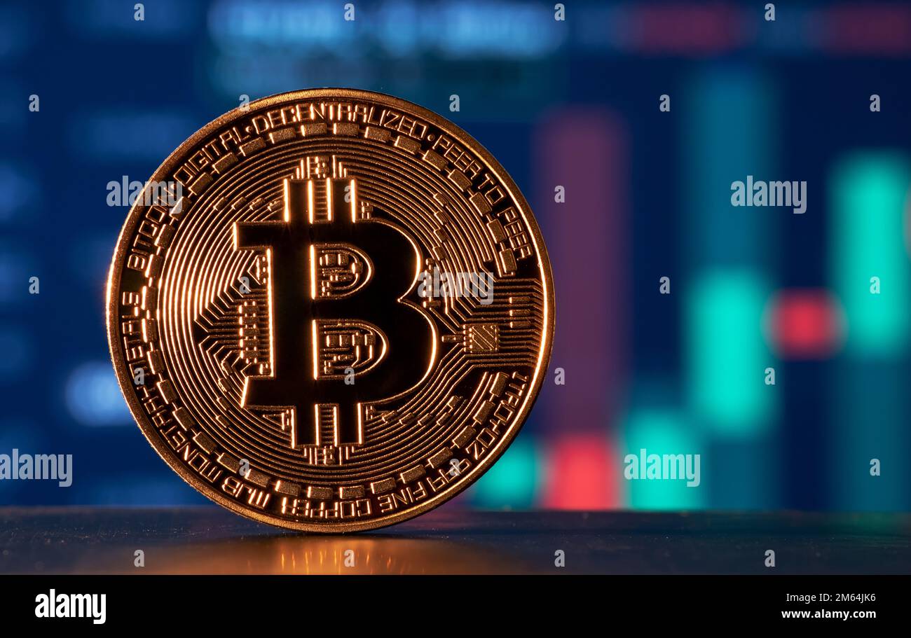 Bitcoin gold coin and defocused chart background. Virtual cryptocurrency concept Stock Photo - Alamy