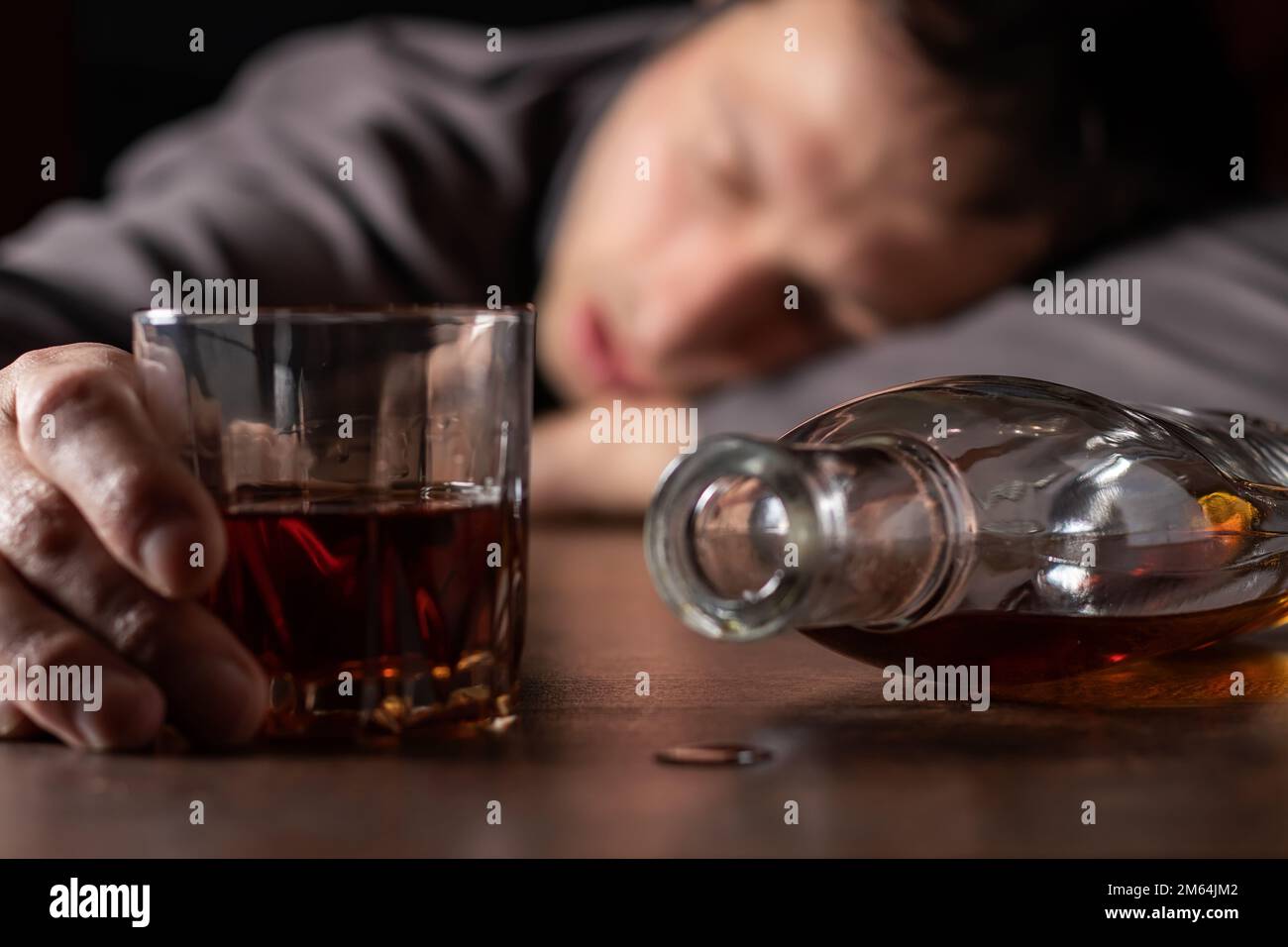 Alcoholism, alcohol addiction and people concept - male alcoholic with ...