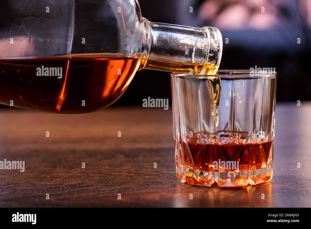Whiskey Pour In Glass, Dark Background, Selective Focus Stock Photo - Alamy