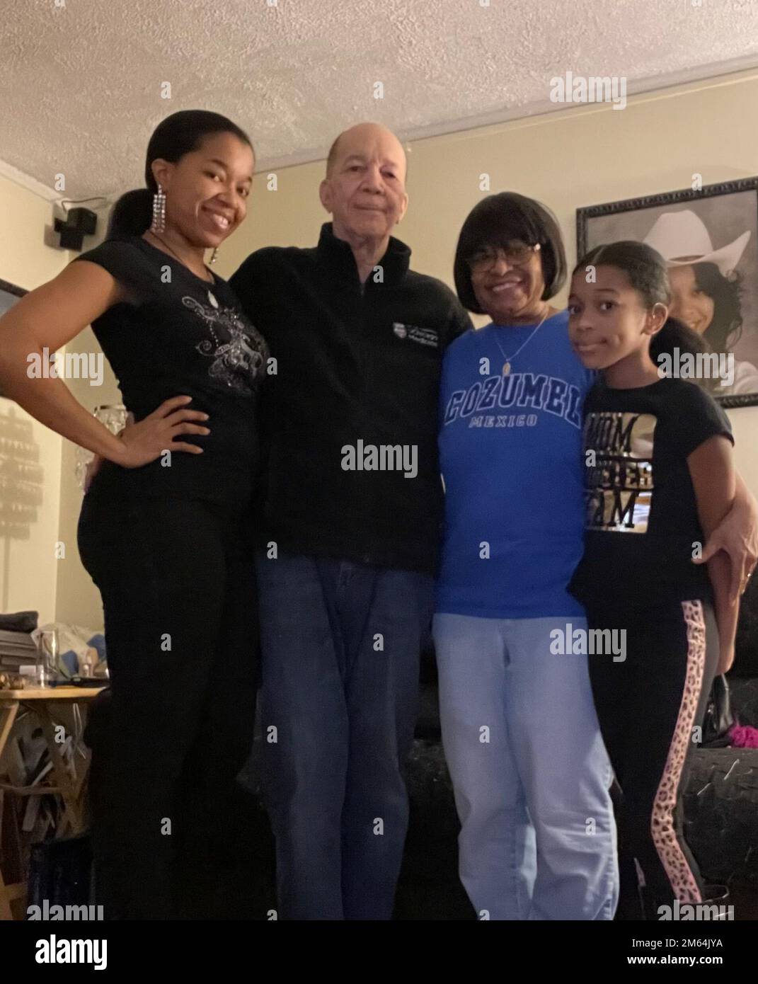 1st Lt. Cyntkaille Coleman pictured here (far left) with her father ...