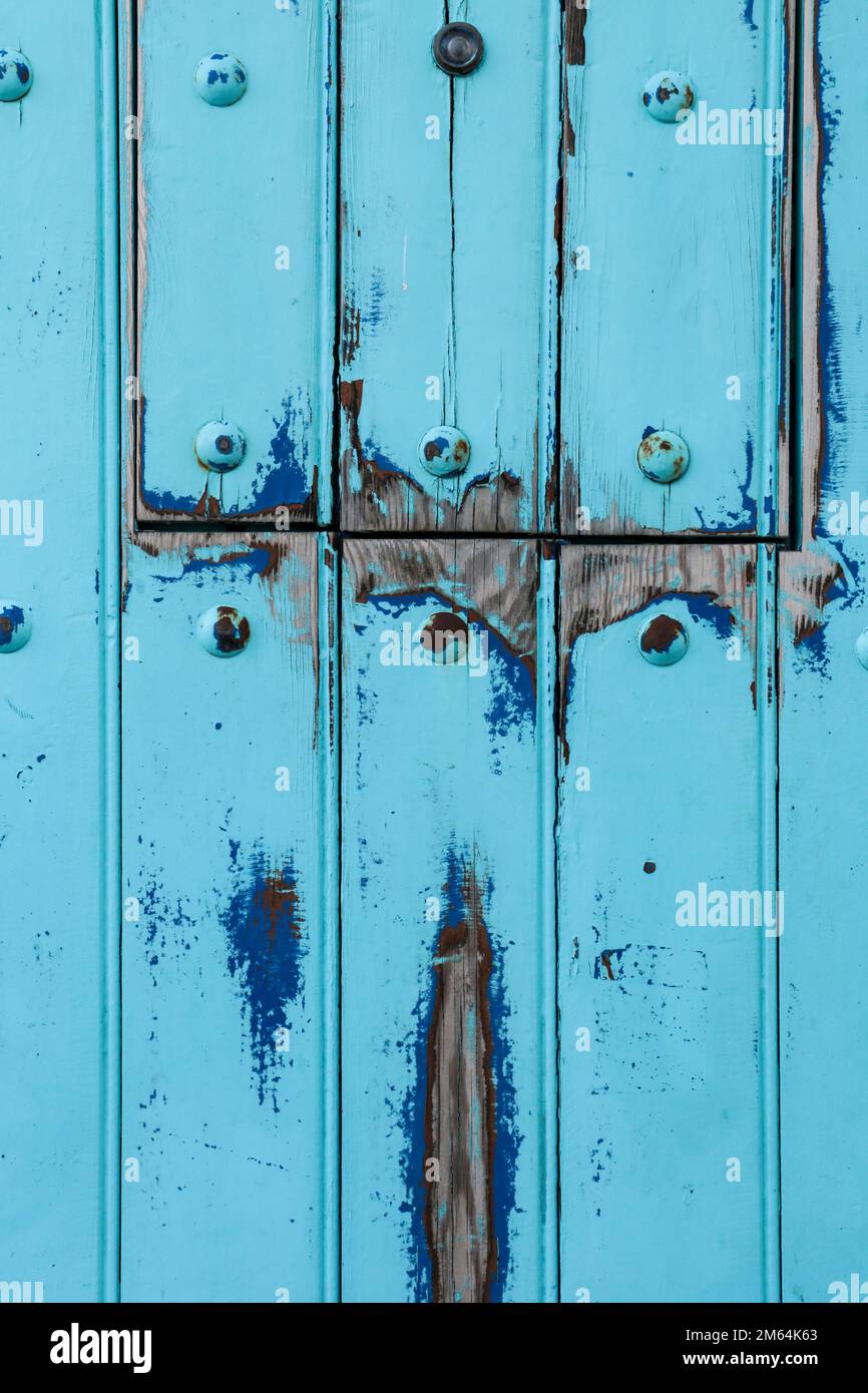 Texture of old blue wooden door in Spain Stock Photo - Alamy