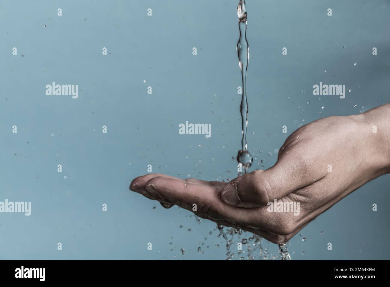 water flows on the hand Stock Photo - Alamy