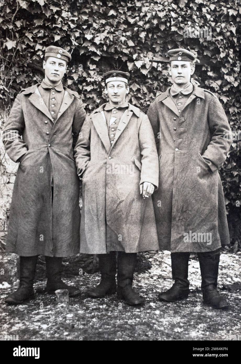 Three German soldiers, one with a medal ribbon for bravery, during the ...