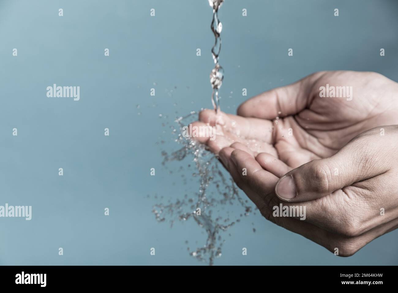 water flows on the hand Stock Photo - Alamy