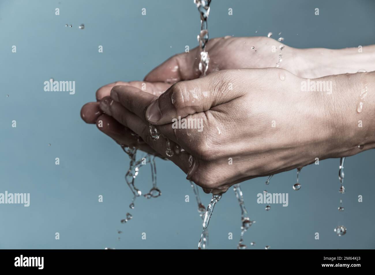 water flows on the hand Stock Photo - Alamy