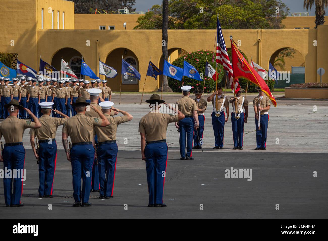 The new Marines and company staff participate in the graduation ...