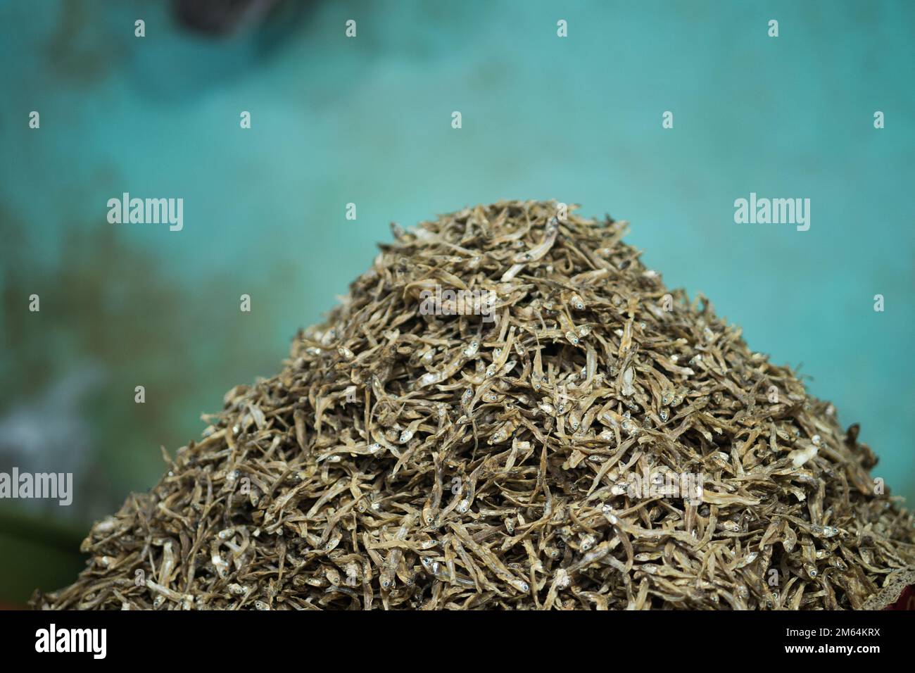 A large pile of dried anchovy fish sold in the market. Indonesia Stock ...