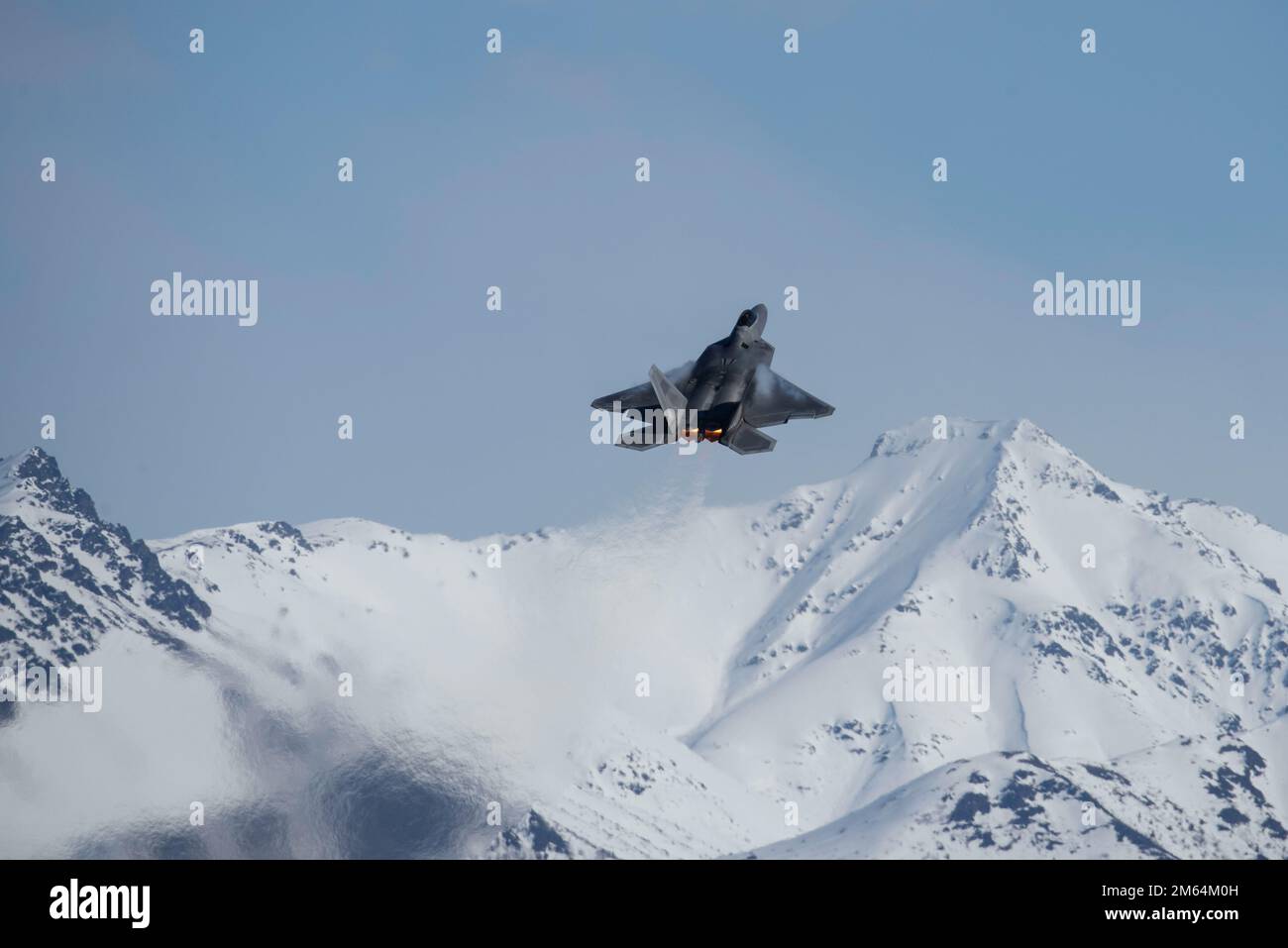A U.S. Air Force F-22 Raptor assigned to the 3rd Wing flies over Joint ...