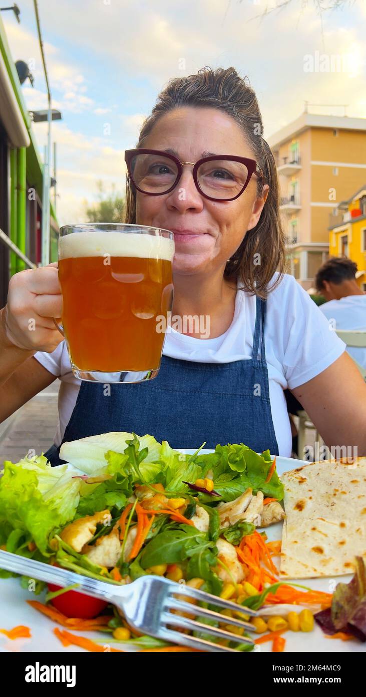 young woman drinking beer Stock Photo - Alamy