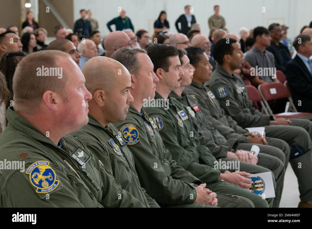 Reserve Citizen Airmen, families and friends watch as Lt. Col. Dominic ...