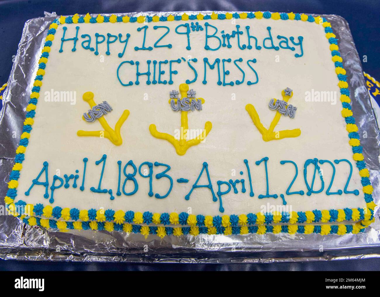 220401-N-JO829-1065 ARABIAN GULF (April 1, 2022) A birthday cake rests ...