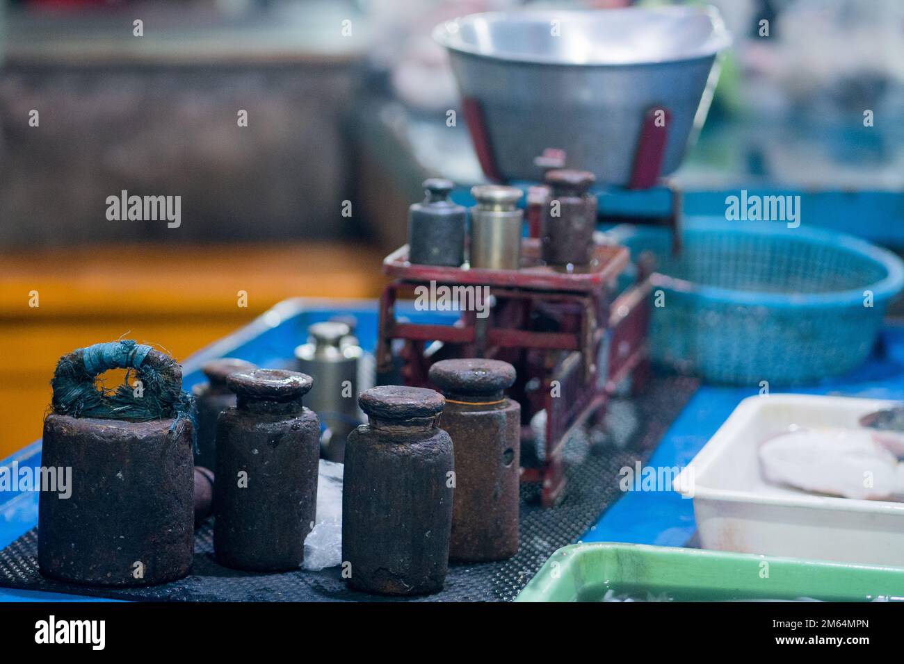 Old rusty iron scale weights and stainless bowl Stock Photo - Alamy