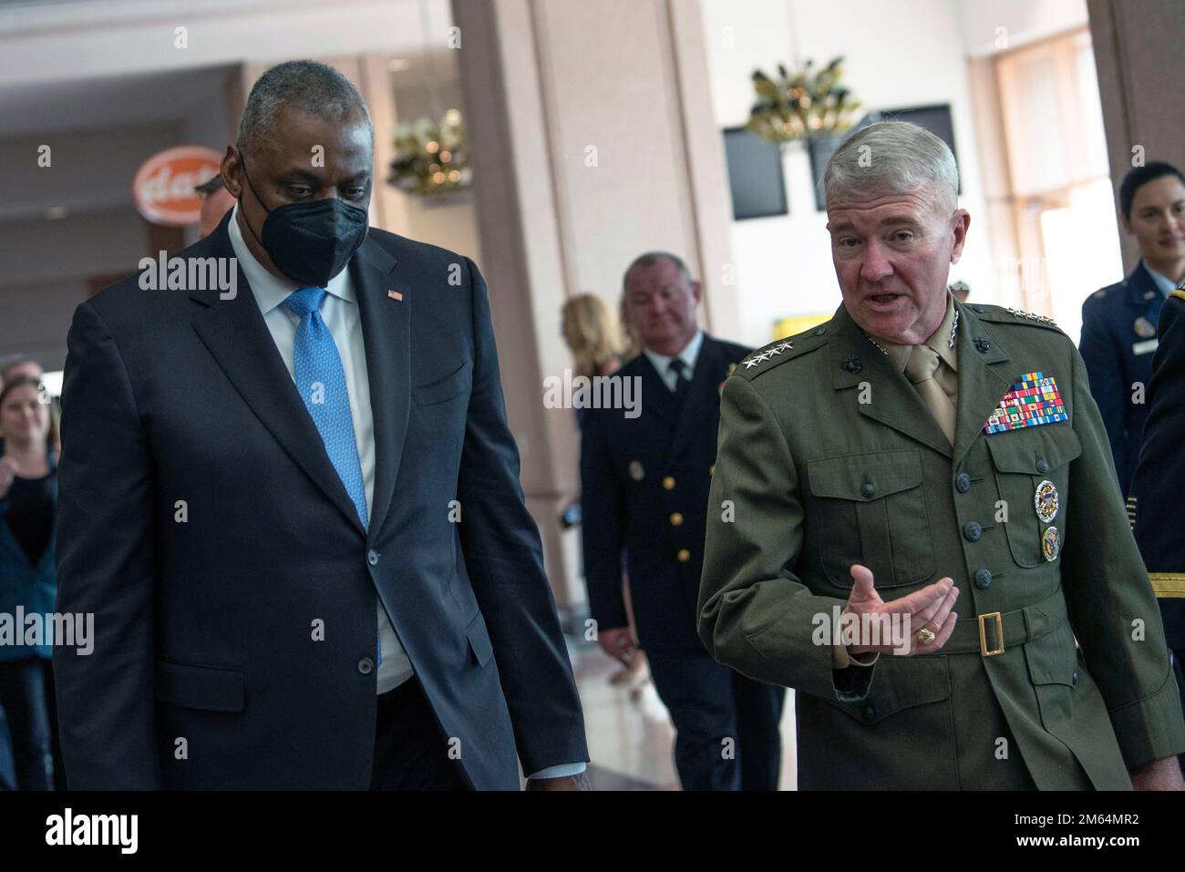 Secretary of Defense Lloyd J. Austin III and the outgoing commander of ...
