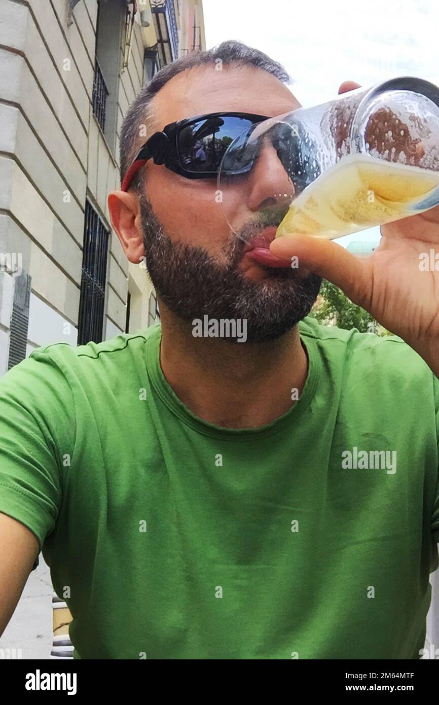 portrait of boy drinking beer Stock Photo - Alamy