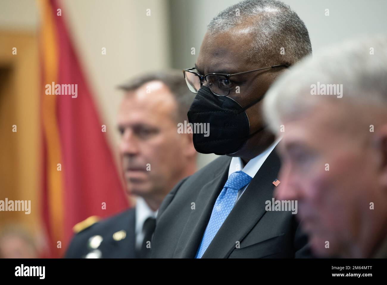 Secretary of Defense Lloyd J. Austin III attends a briefing with, left ...