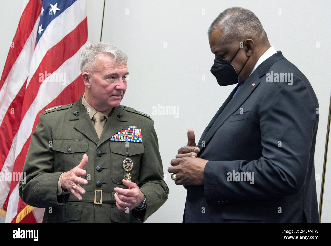Secretary of Defense Lloyd J. Austin III and the outgoing commander of ...