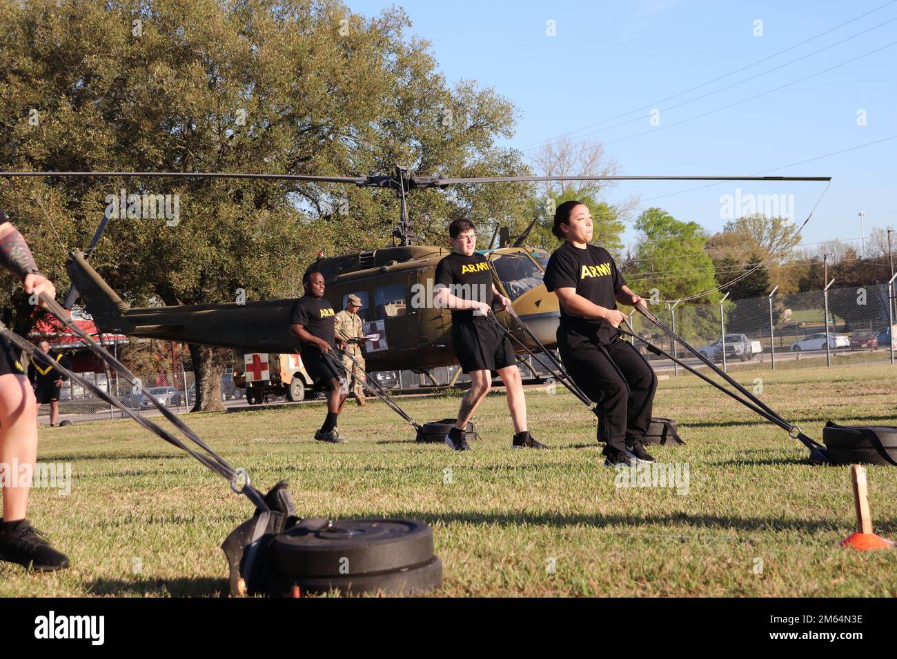 Soldiers from the 394th Field Hospital complete the sled drag portion ...